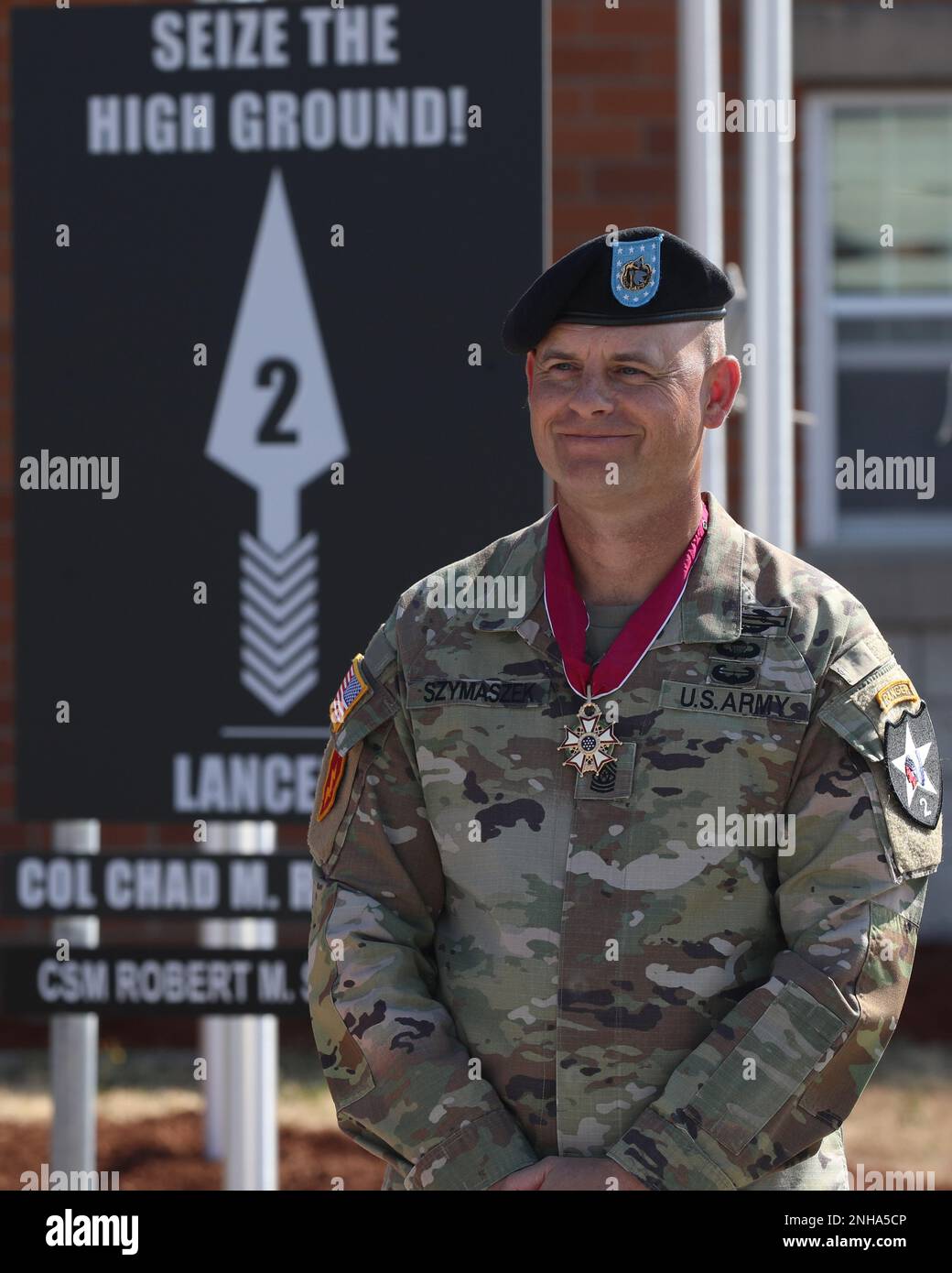 Outgoing Command Sgt. Maj. Robert Szymaszek, assigned to 2nd Strkyer Brigade Combat Team, 7th ...