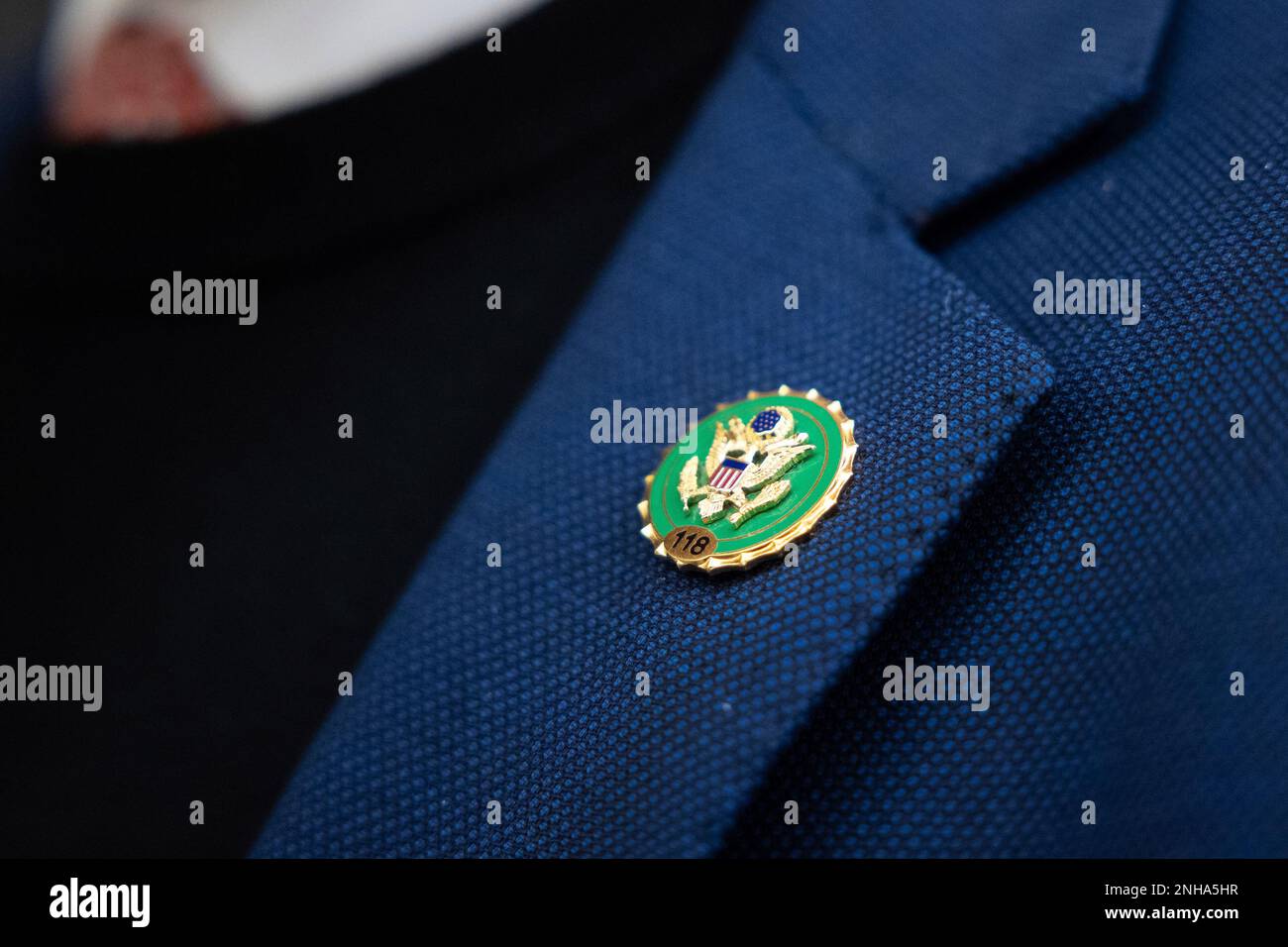 A House of Representatives member pin is worn by Rep. George Santos (R ...