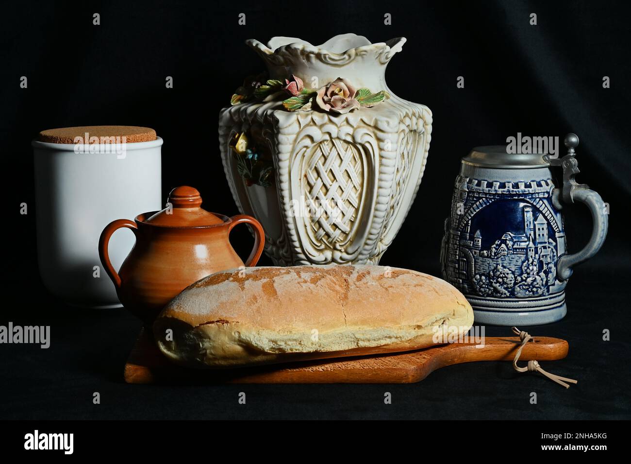 Still-Life composed of simple things like a loaf of Tuscan bread, a ...