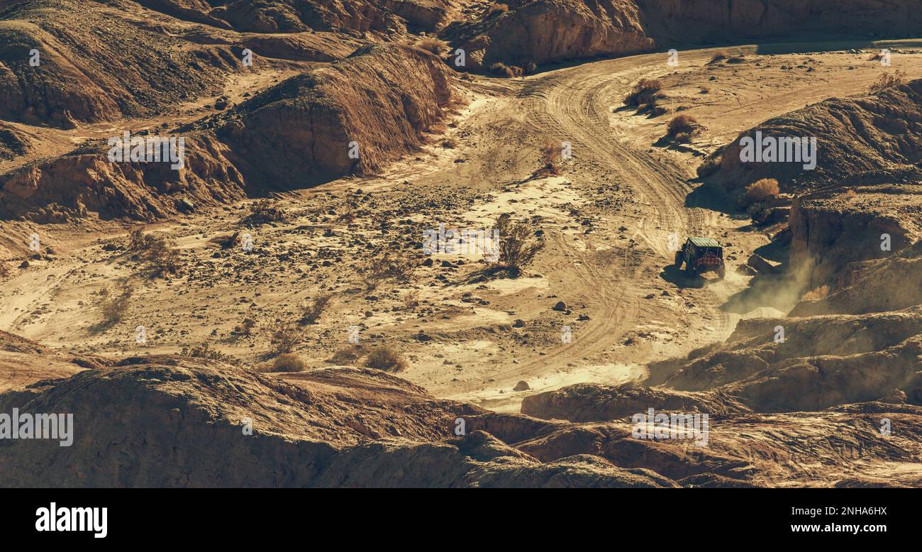 Desert Landscape Off Roading. All Wheels Drive Vehicle on a Sandy Rural ...