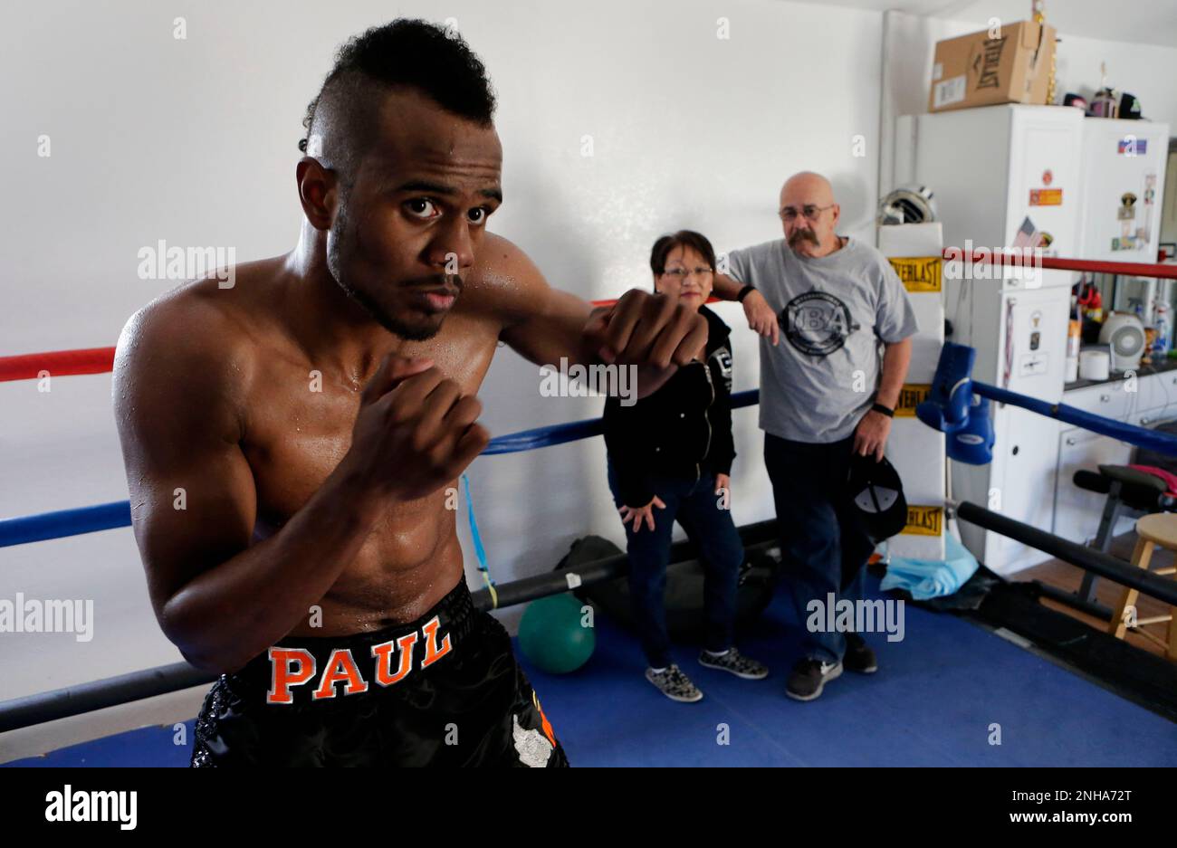 Manager Kathy and trainer Max Garcia with their boxer Paul Mendez on ...