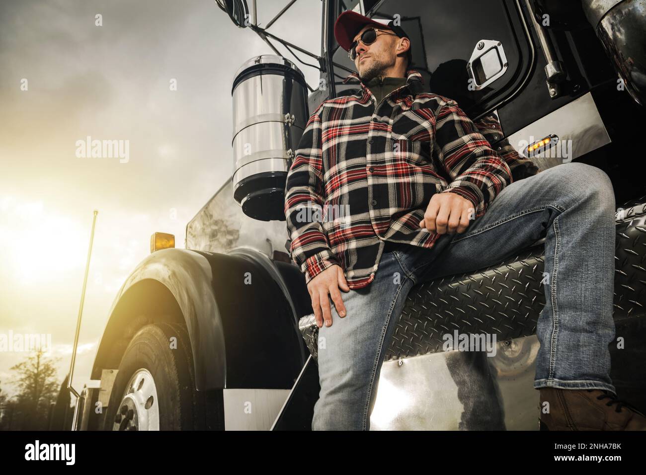 Transportation Industry Theme. Professional Truck Driver Next to His ...