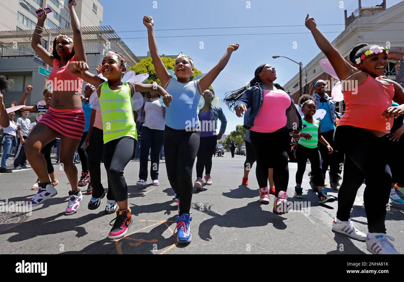 Children with the "Dancing Queen Dollz", a dance group from San ...