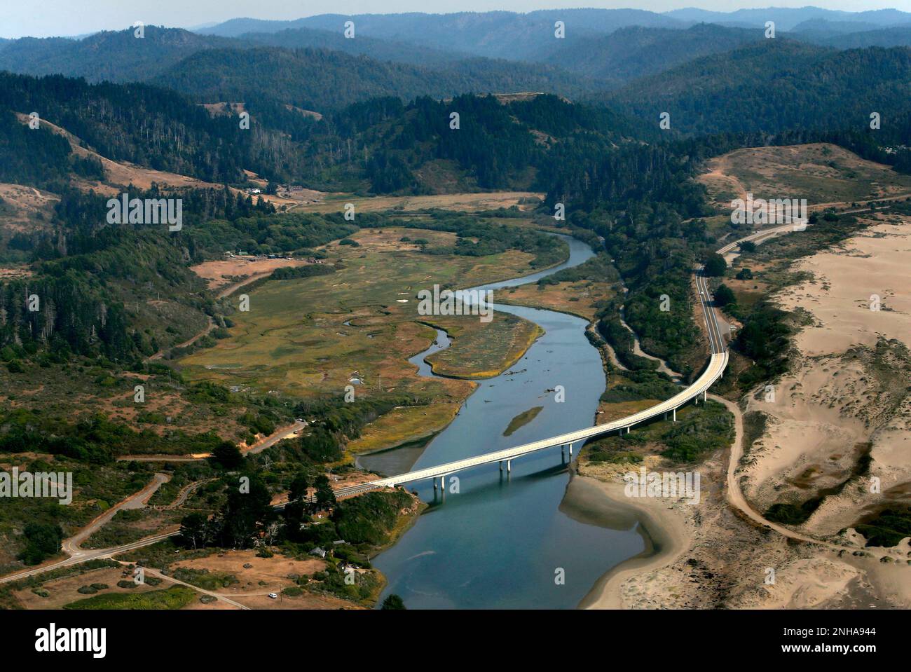 The Ten Mile River estuary as it reaches the Pacific Ocean, with ...