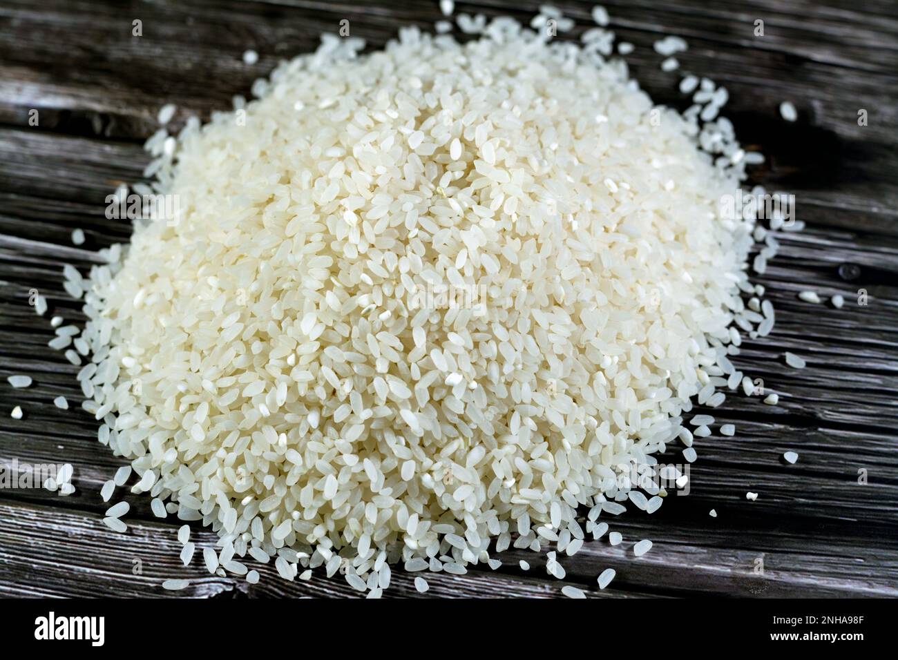 A pile of raw short grain white rice, White rice is milled rice that ...