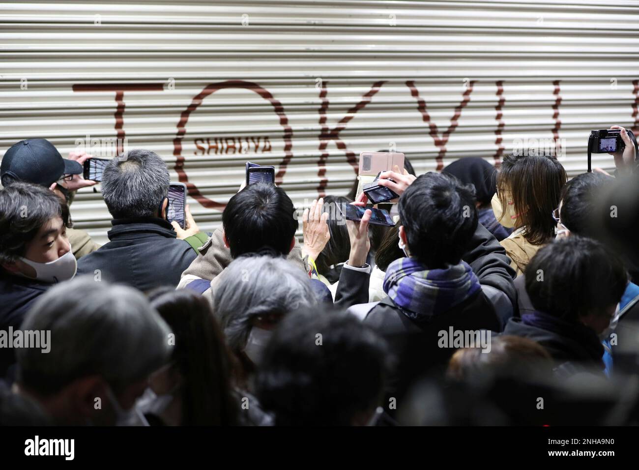 Customers take photos of Tokyu Department Store Shibuya Honten, which ...