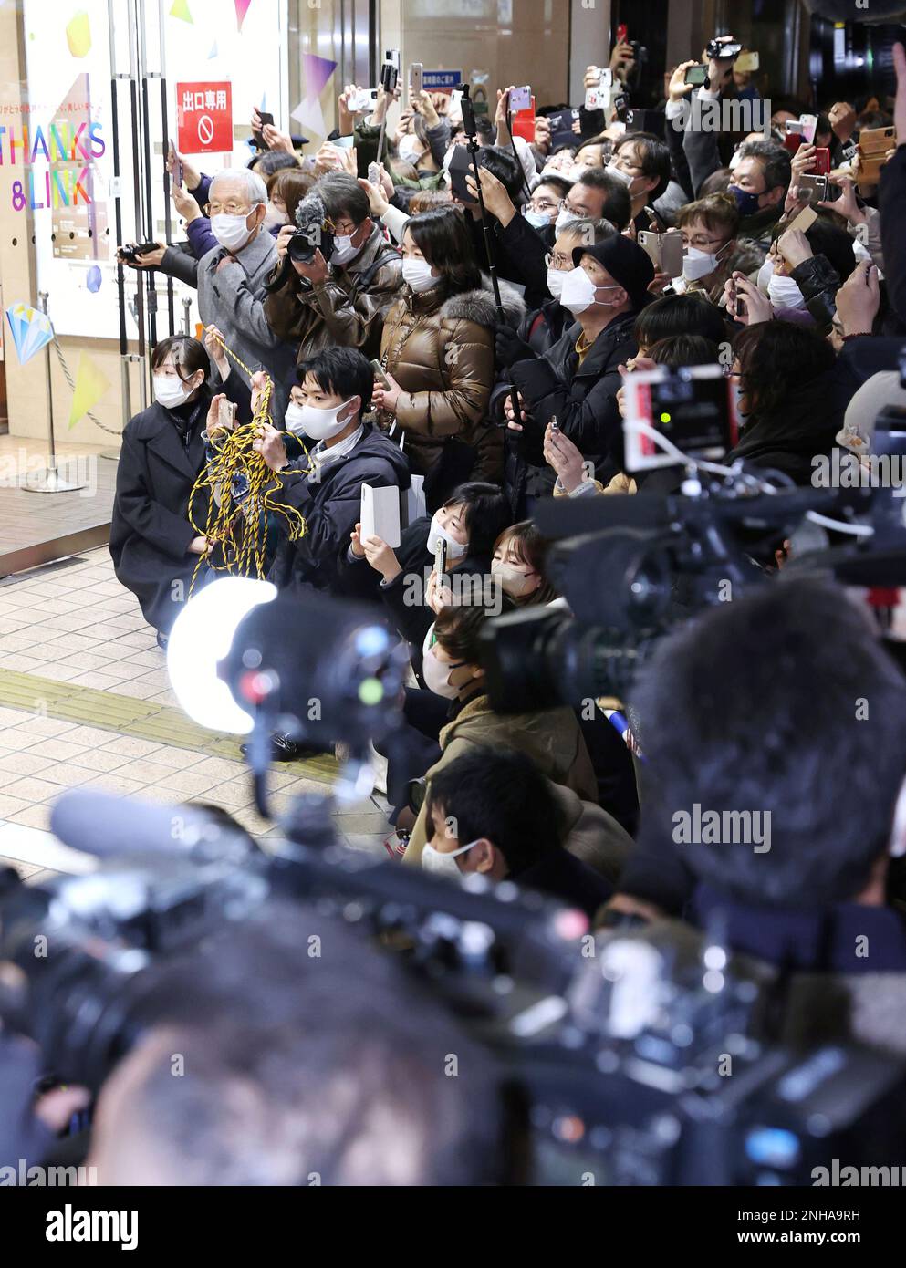 Customers take photos of Tokyu Department Store Shibuya Honten, which ...