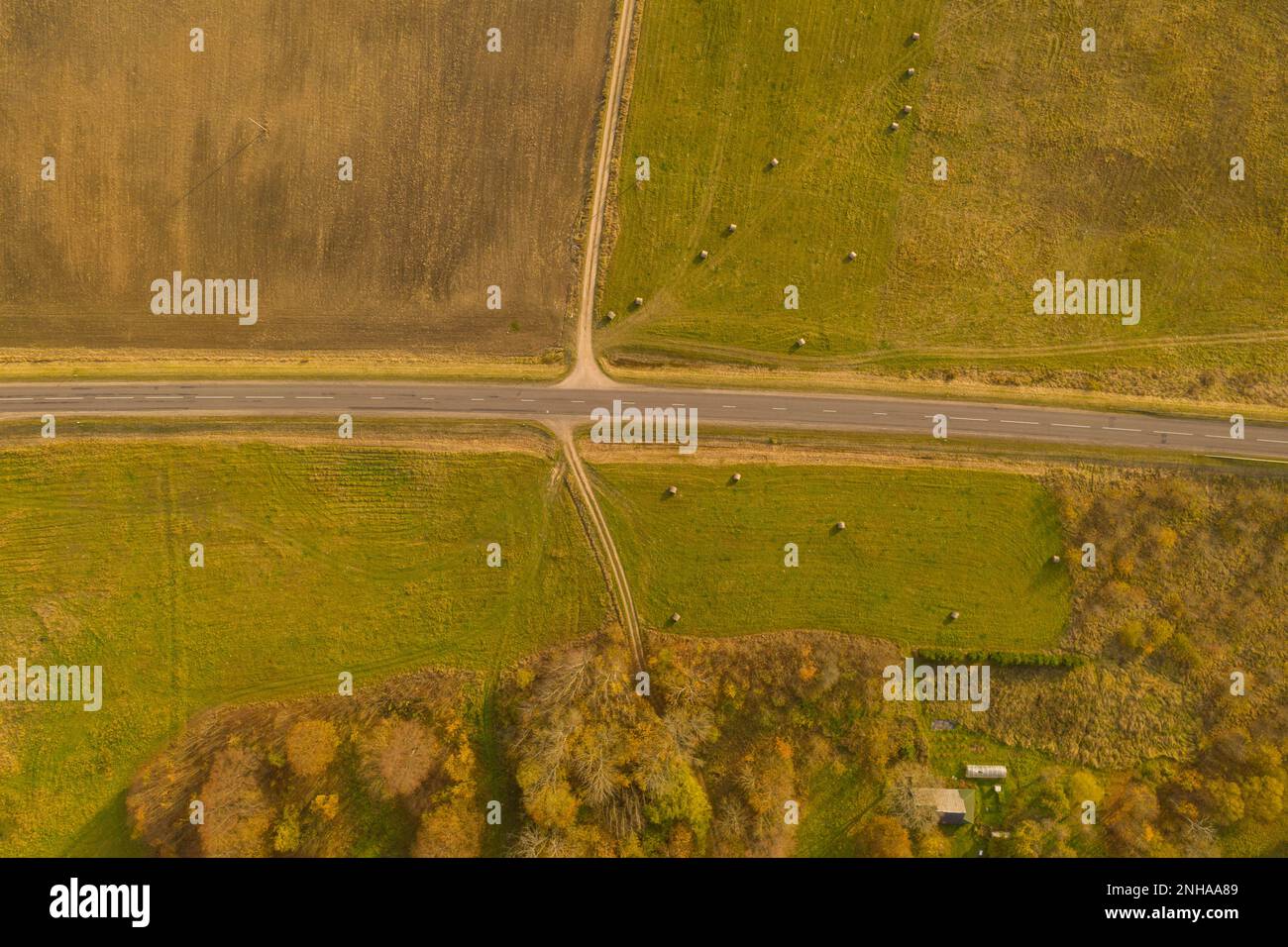 Drone photography of top view road through agriculture land during ...