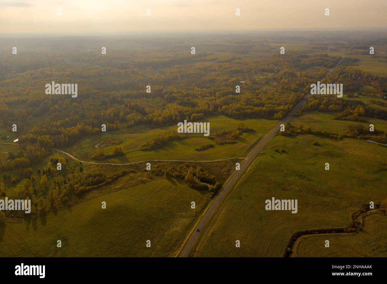 Drone photography of top view road through agriculture land during ...