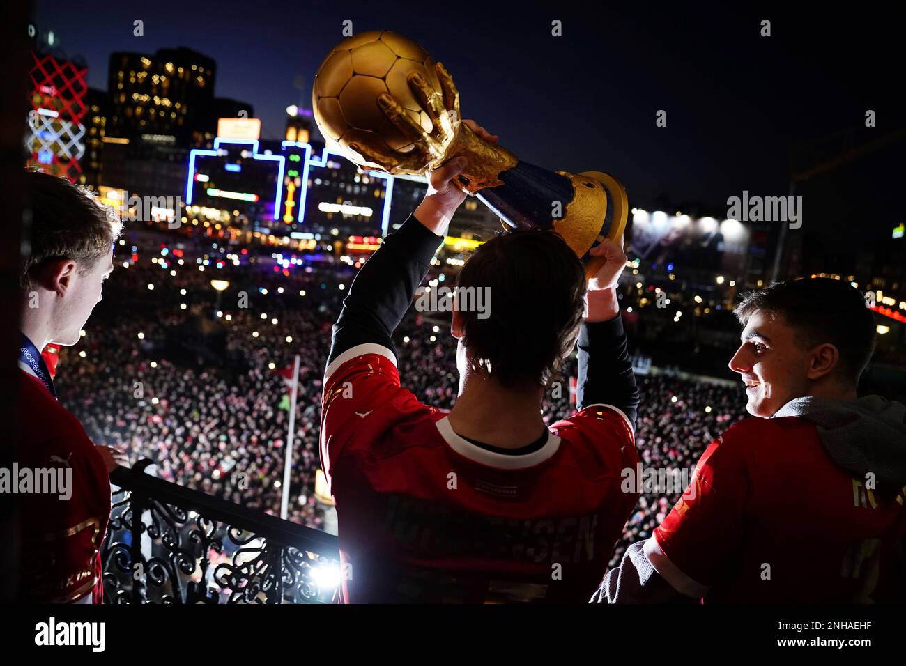 Denmark's Lukas Jorgensen holds up the 2023 World Championship handball ...