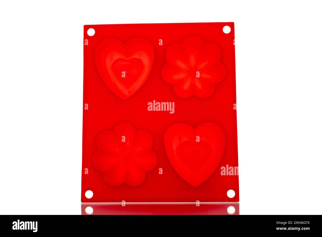 Red silicone cookie cutter, macro, isolated on white background Stock ...