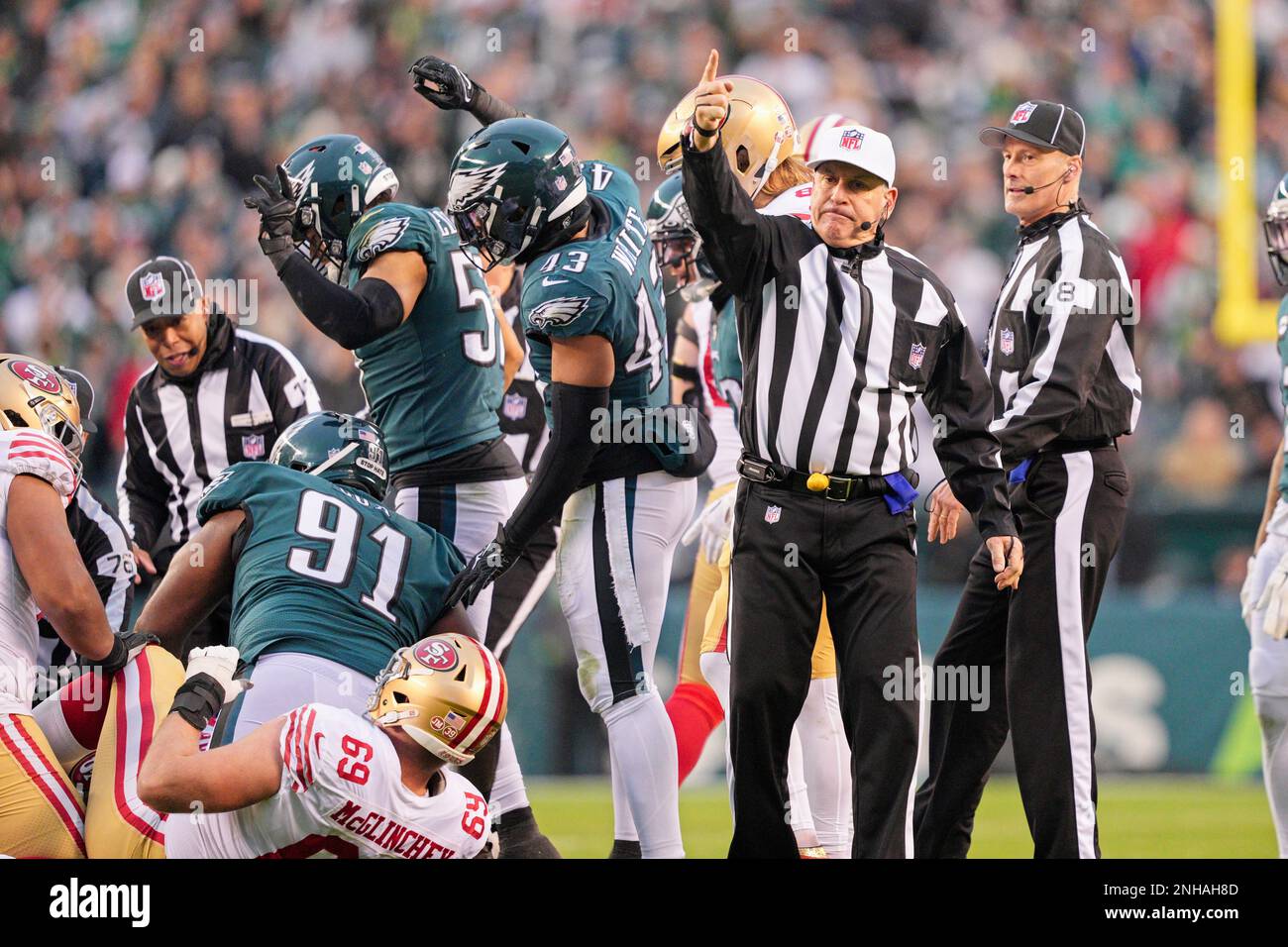 PHILADELPHIA, PA - JANUARY 29: Referee John Hussey (35) signals a ...