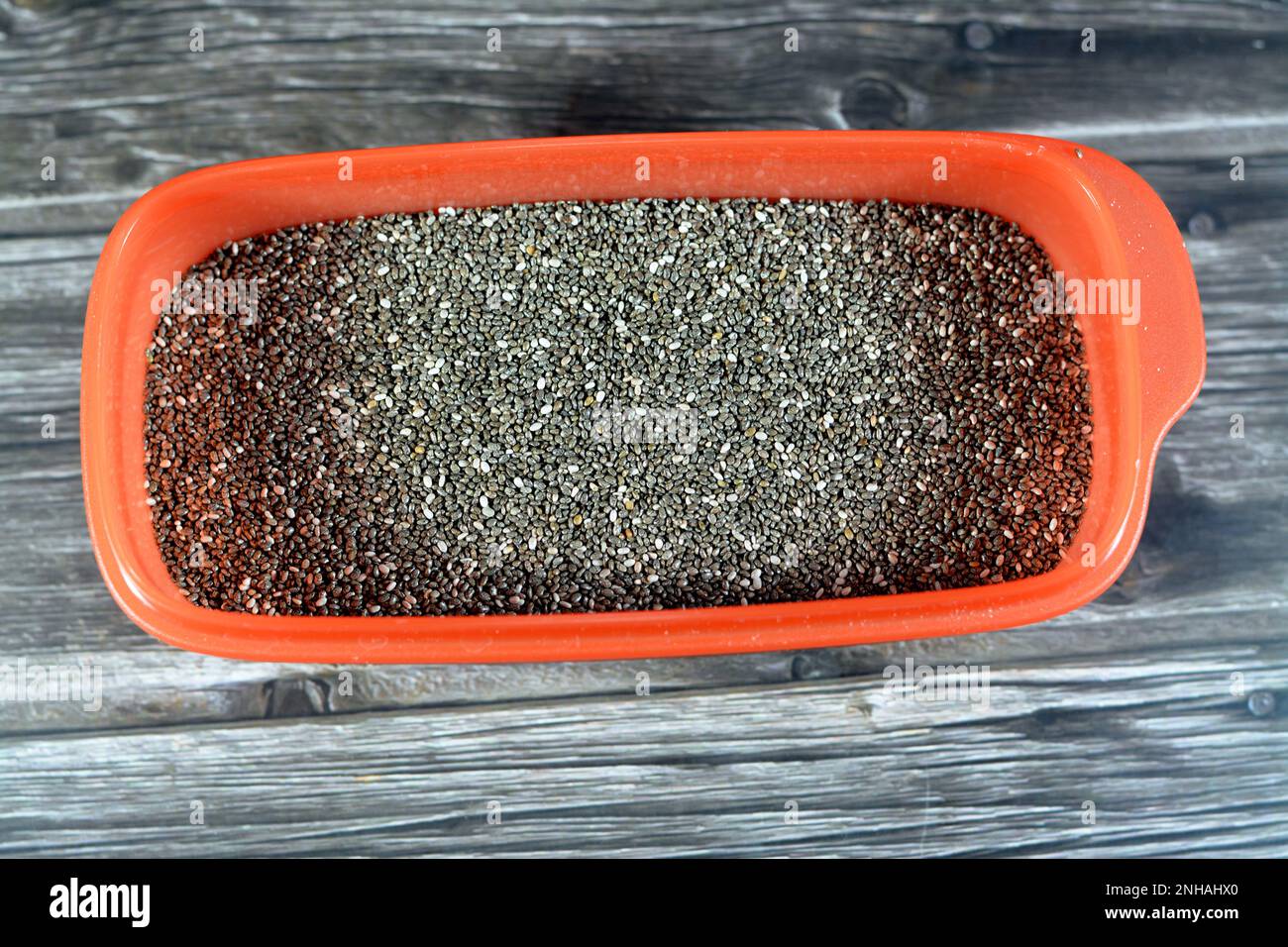 Dried chia seeds with a high content of dietary fiber, vitamins, minerals, protein, fat and ...