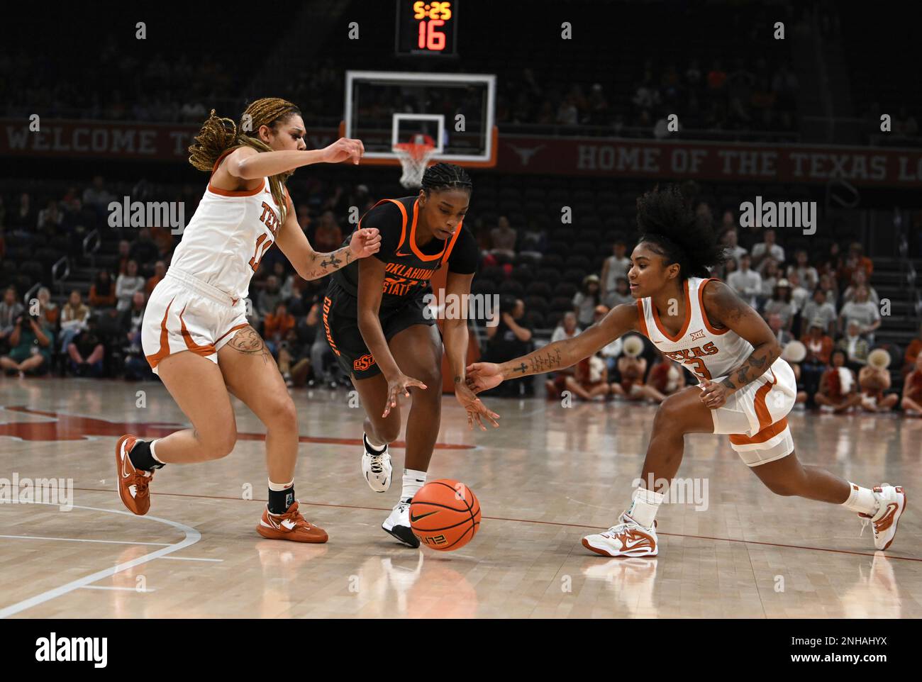 AUSTIN, TX - JANUARY 28: Oklahoma State Cowgirls Terryn Milton (center ...