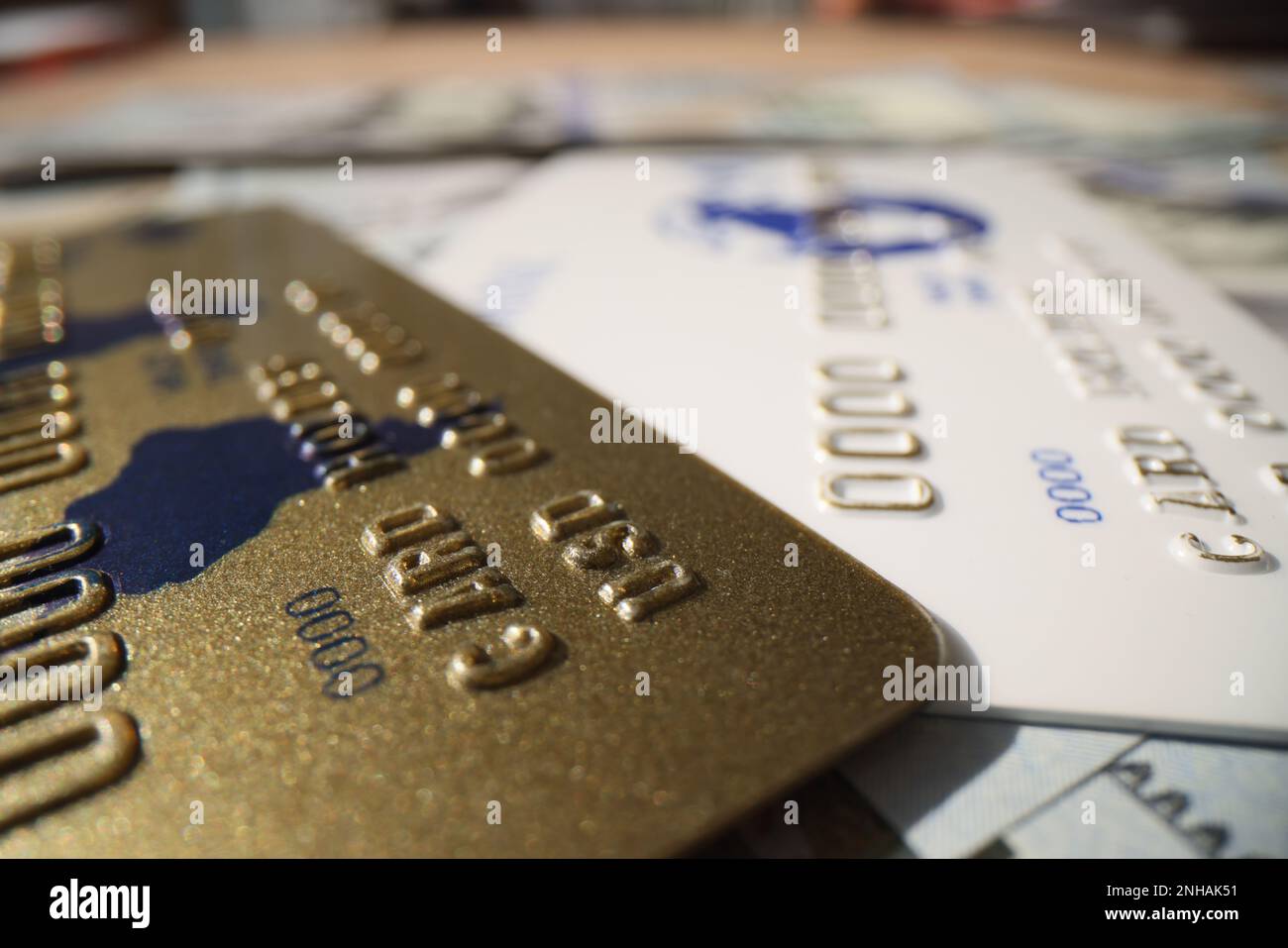 Plastic gold and platinum credit card, close-up Stock Photo - Alamy