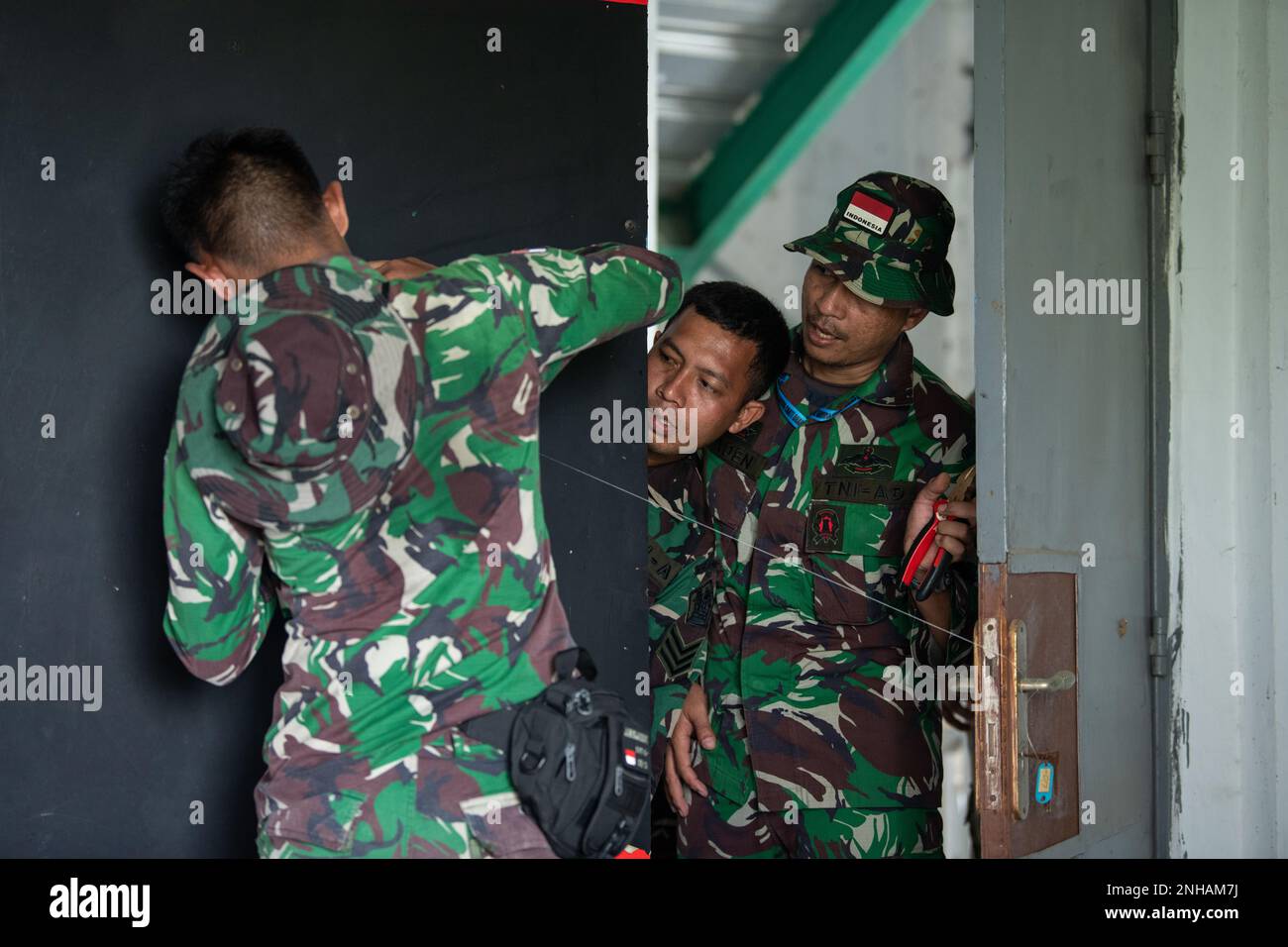 Indonesian Army soldiers conduct a culminating explosive ordnance ...