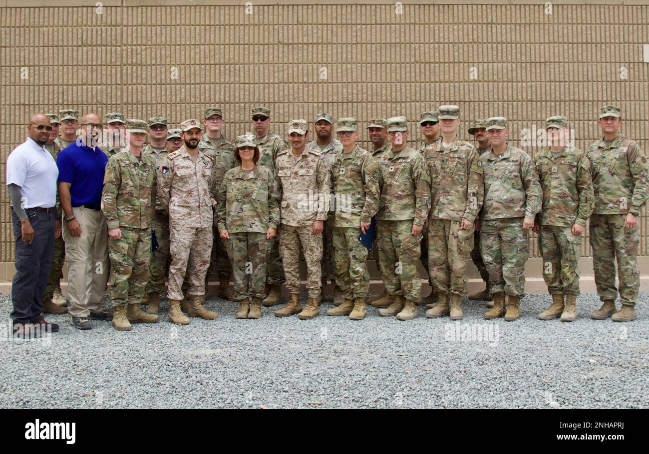 Two Kuwait Army officers joined sixteen U.S. Army Soldiers in posing ...
