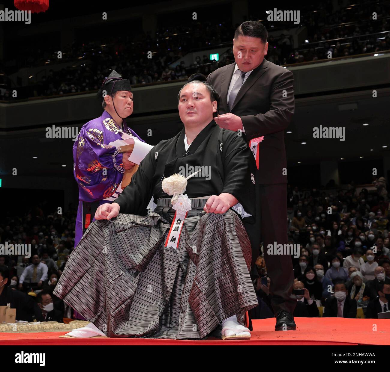 Former yokozuna Hakuho (C) attends Danpatsushiki, his official ...