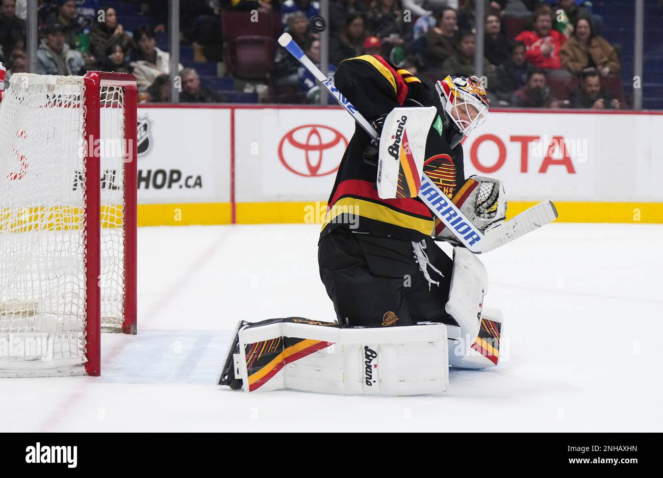 Vancouver Canucks goalie Collin Delia makes a blocker save against the ...