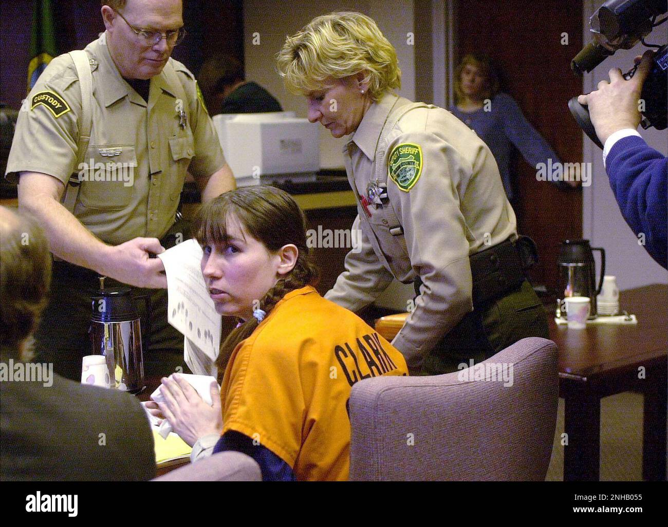 Treva Throneberry is fingerprinted at the conclusion of her sentencing ...