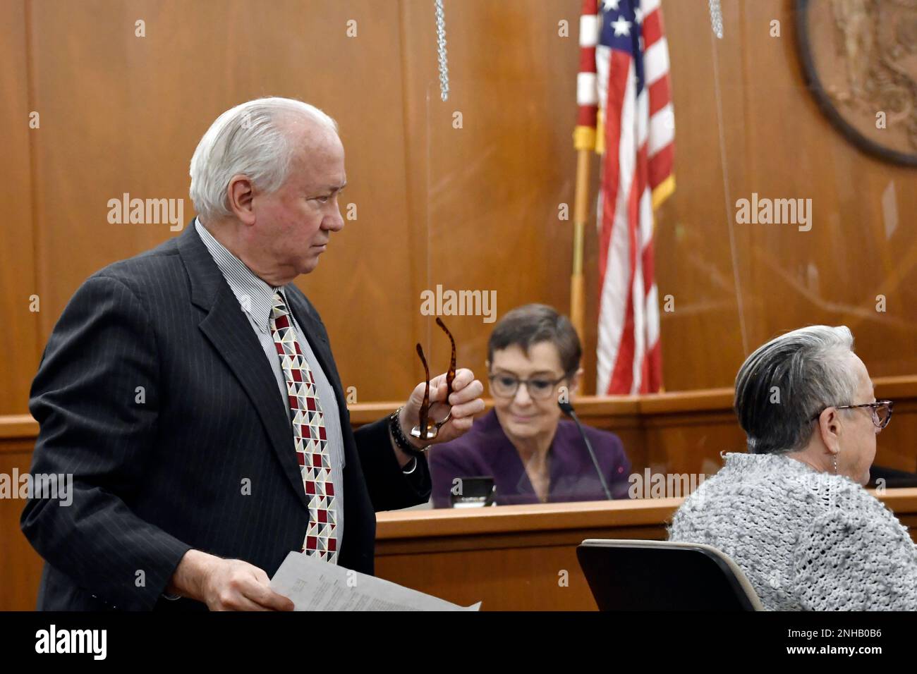 Special Prosecutor Robert Jambois, left, holds the late Julie Jensen's ...