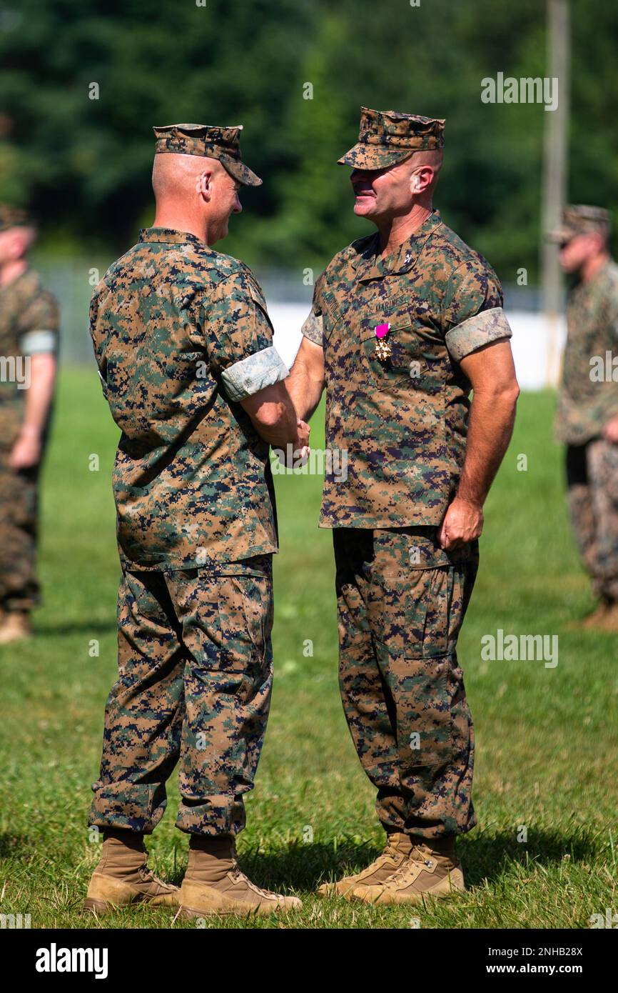 U.S. Marine Corps Maj. Gen. Julian D. Alford, left, commanding general ...
