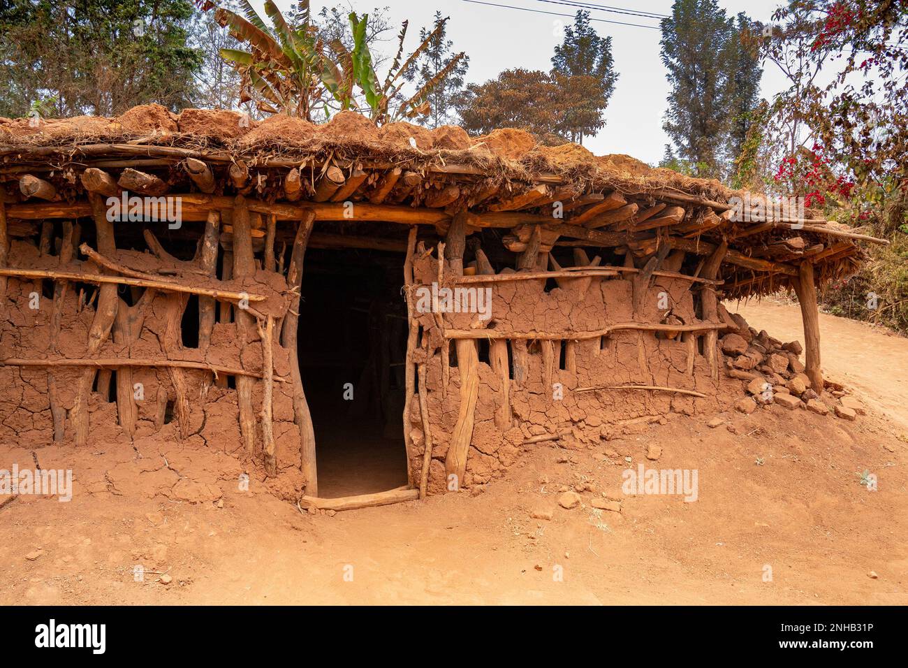 Karatu, Tanzania - October 16th, 2022: A traditional hut made of mud ...