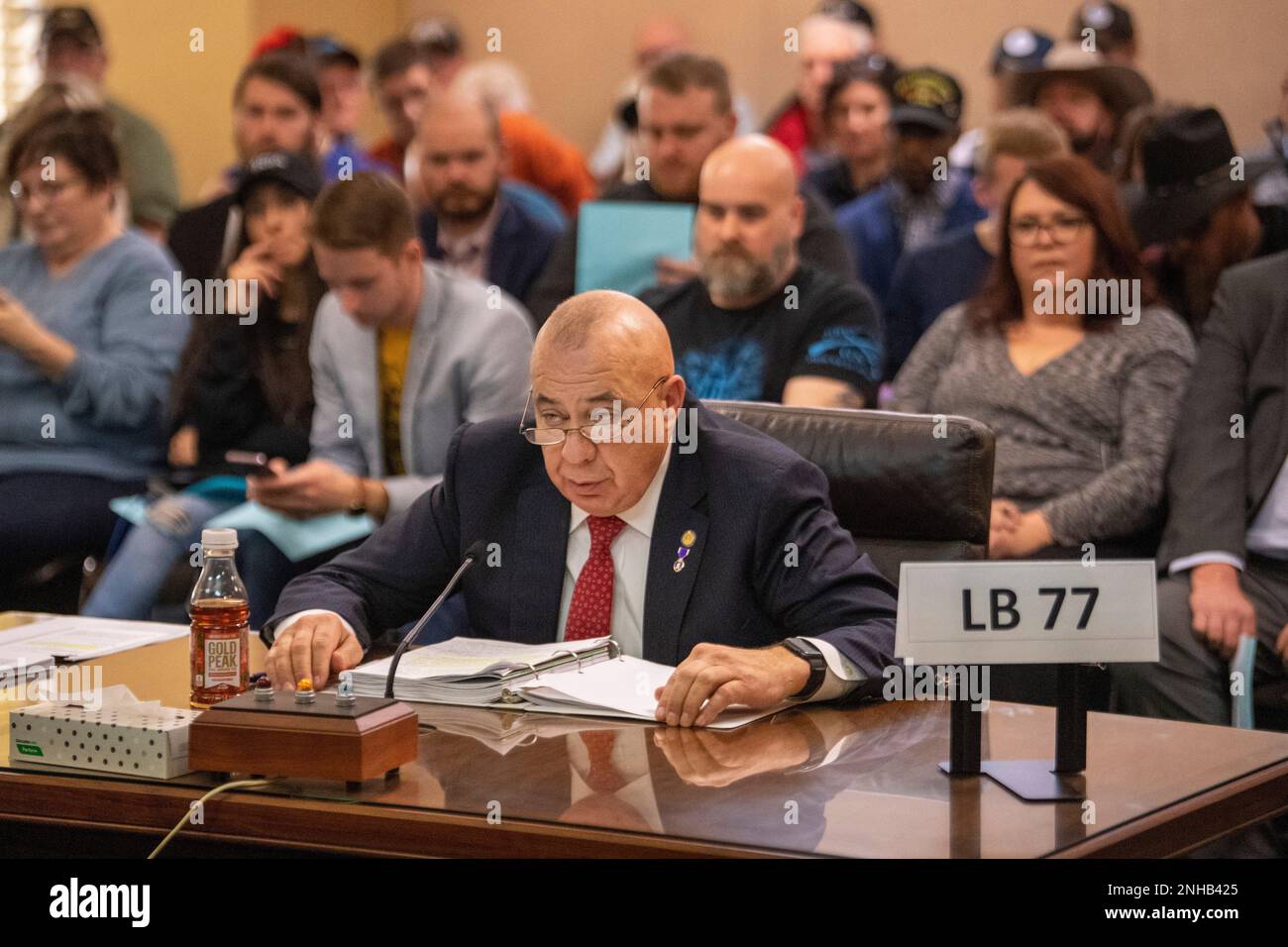 Sen. Tom Brewer introduces LB77 during a judiciary committee hearing on ...