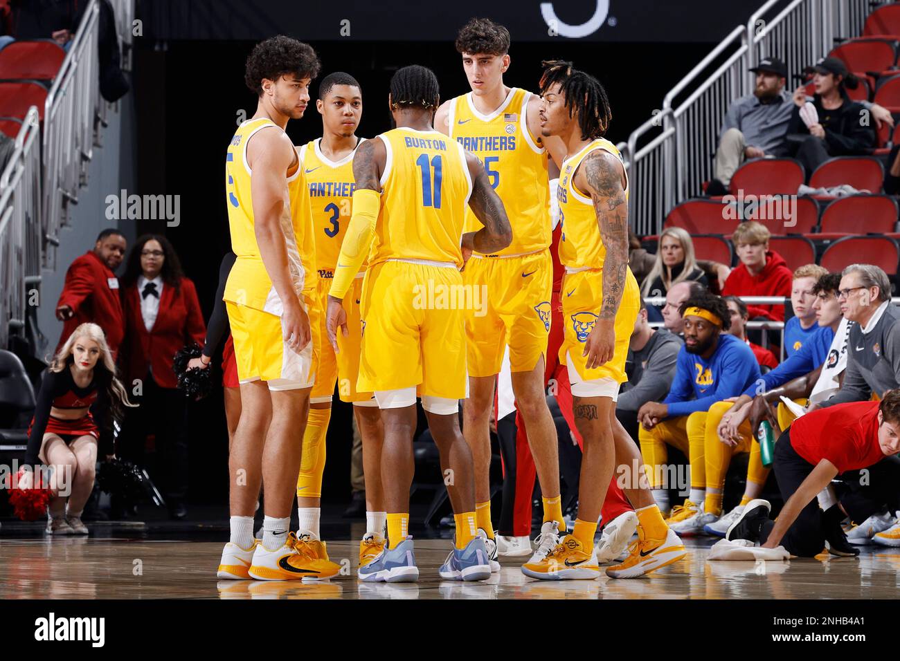 LOUISVILLE, KY - JANUARY 18: Pittsburgh Panthers players huddle near ...