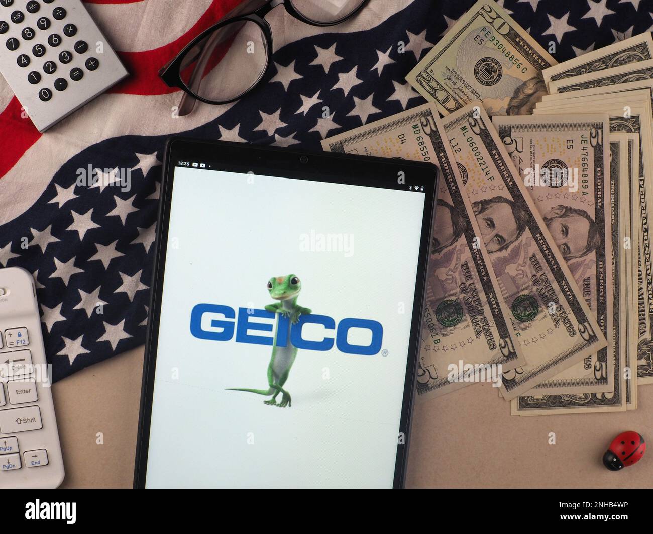 In this photo illustration, Government Employees Insurance Company (GEICO) logo seen displayed ...
