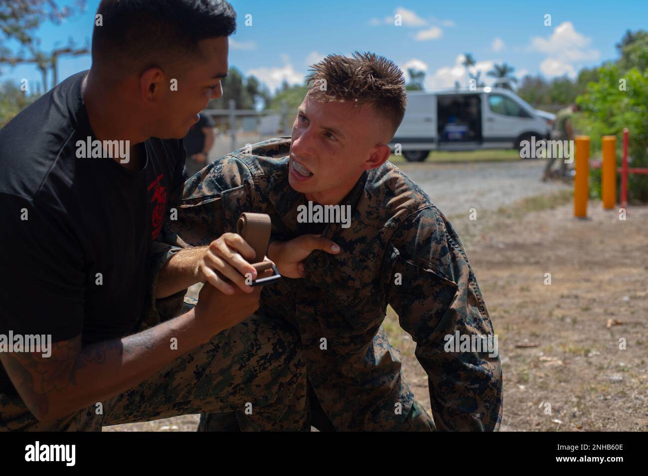 U.S. Marine Corps Staff Sgt. Emmanuel Sepulveda, left, a Marine Corps ...
