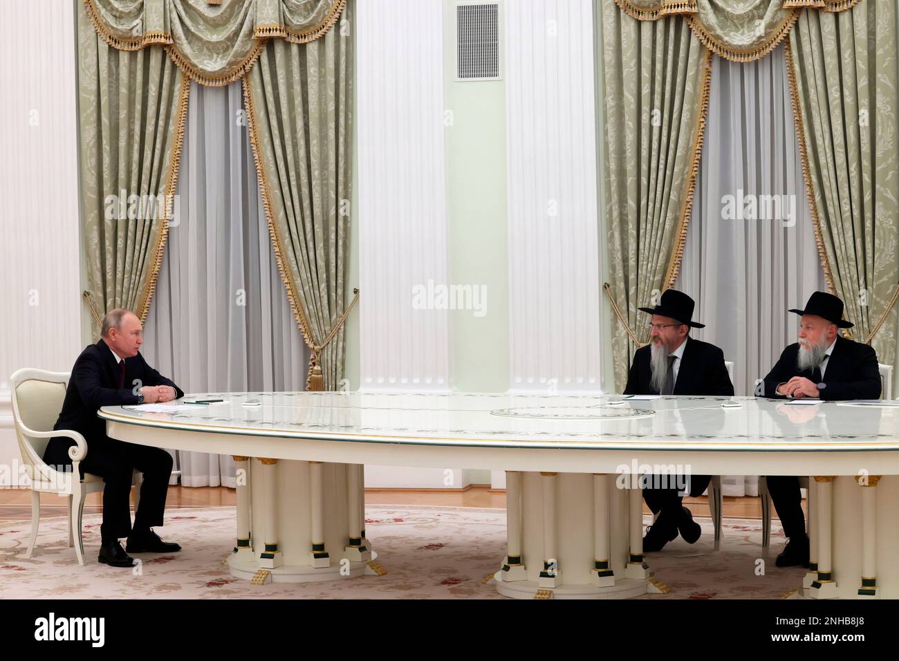 Russian President Vladimir Putin, left, speaks to Chief Rabbi of Russia ...