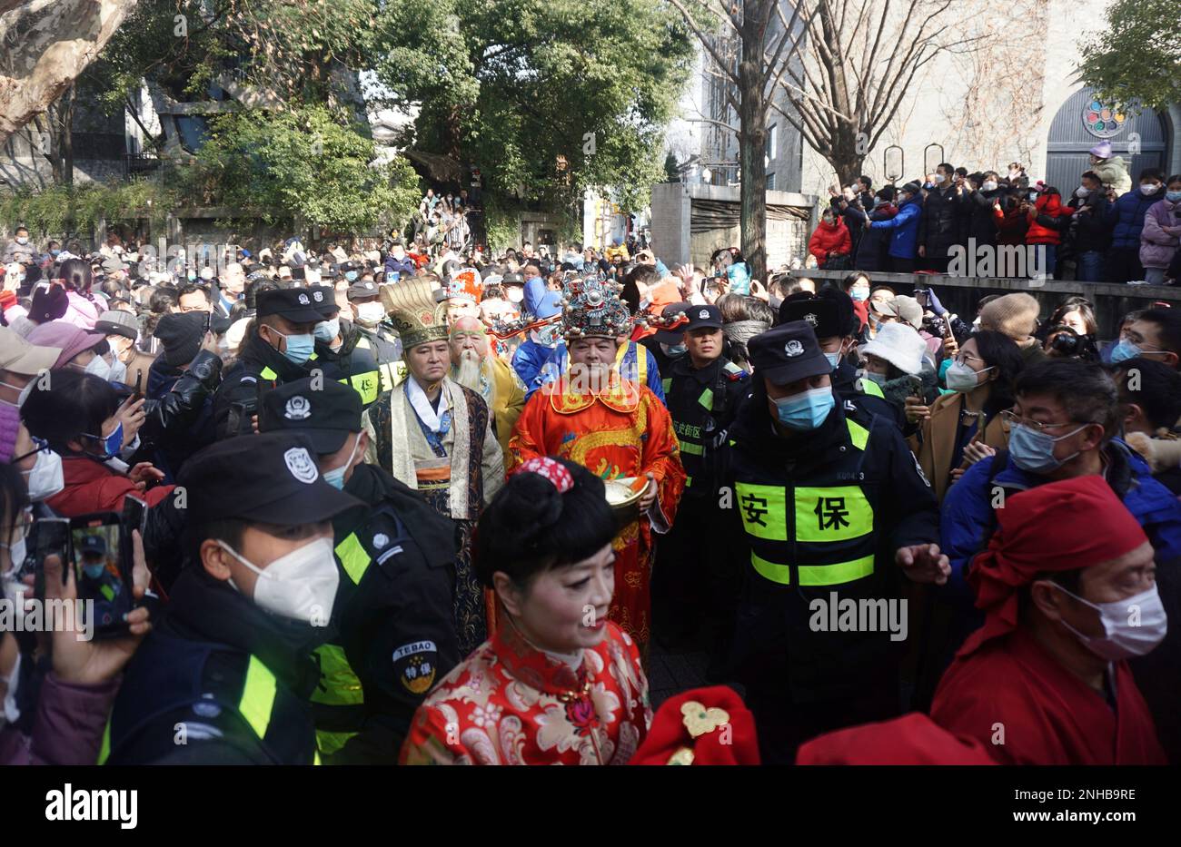 An actor impersonating God of Fortune brings good wishes to businesses ...