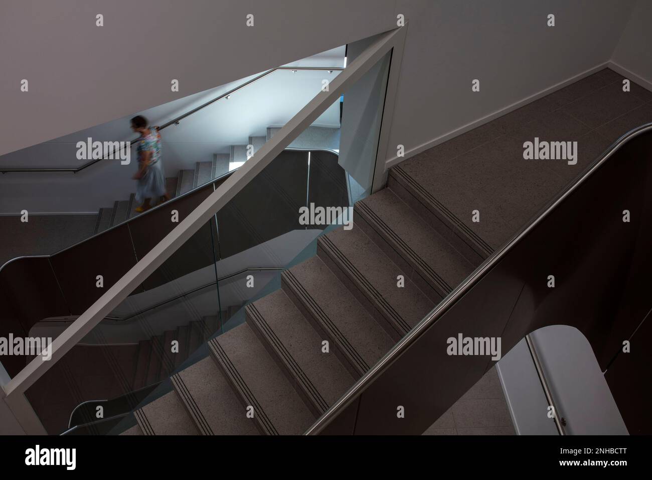 Someone walking down the stairs. Centenary Building, University of ...
