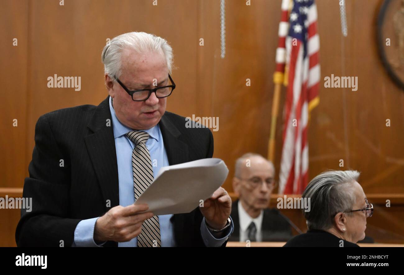 Special Prosecutor Robert Jambois, left, looks over a document as he ...