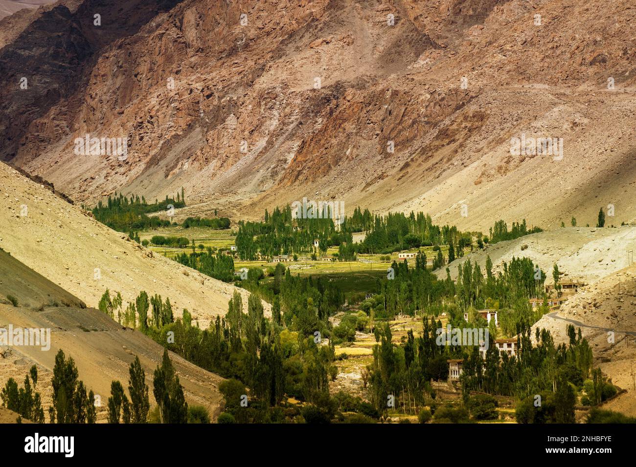 Beautiful play of light on the valley of Basgo, Himalayan mountains in ...