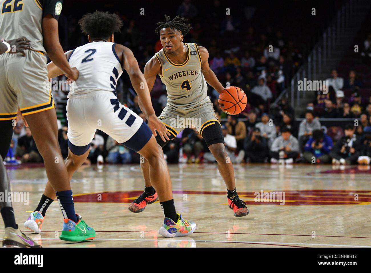 LOS ANGELES, CA - JANUARY 07: Wheeler guard Isaiah Collier tries to ...