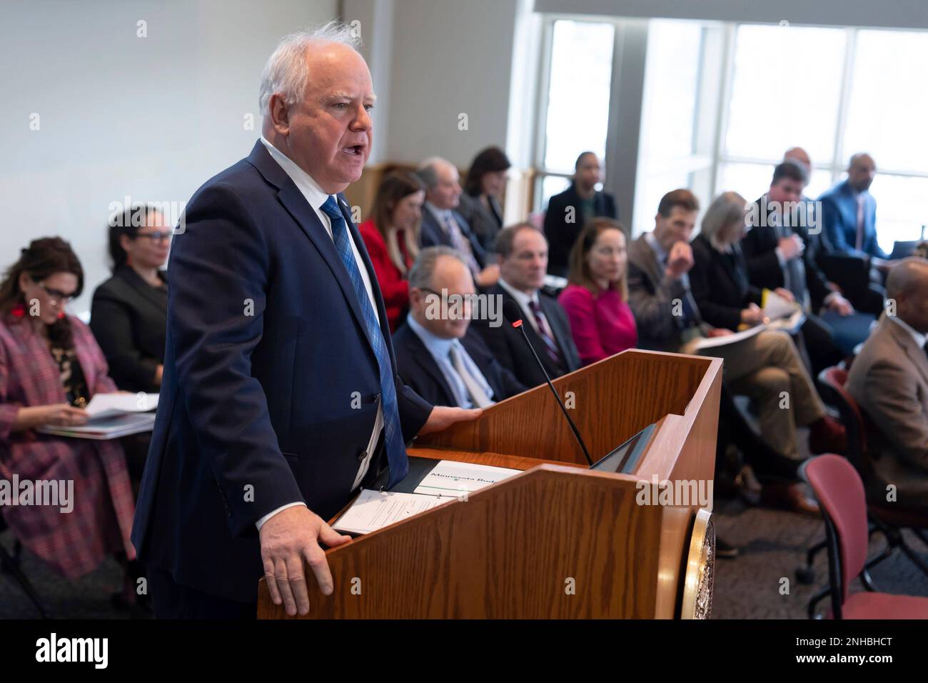 With his entire cabinet in the background, Gov. Tim Walz unveiled his ...