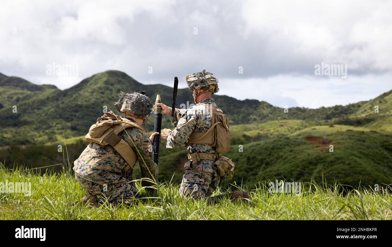 U.S. Marine Corps Lance Cpl. Joseph Flowers (left), an intelligence ...