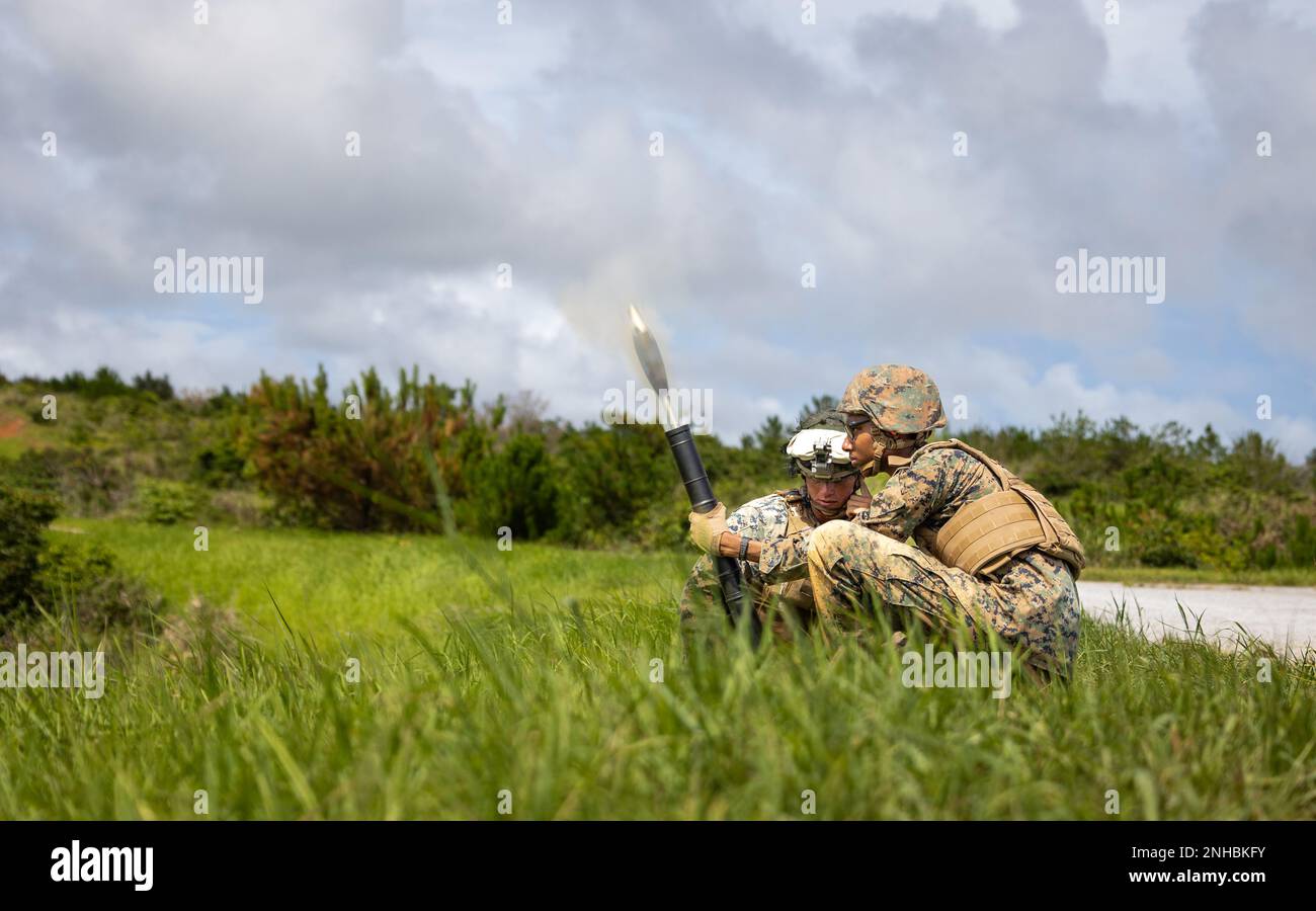 U.S. Marine Corps Pfc. Jaylen Davis (right), a combat graphics ...