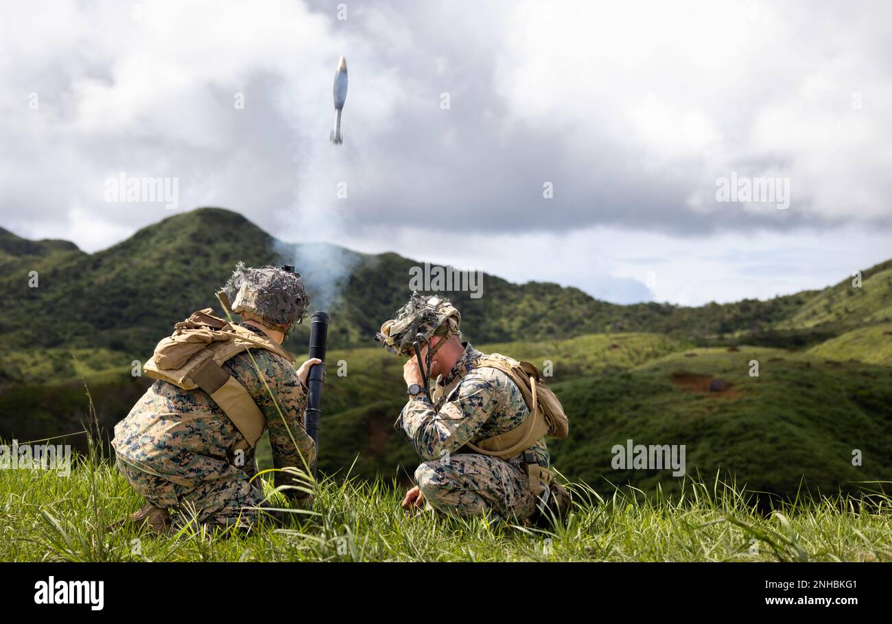 U.S. Marine Corps Lance Cpl. Joseph Flowers (left), an intelligence ...