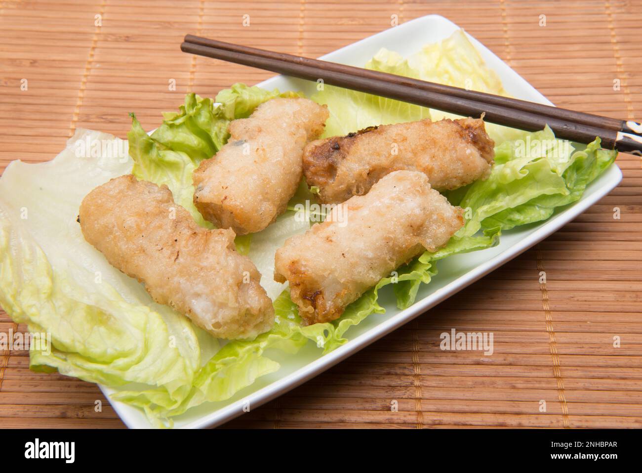 spring rolls or Vietnamese rolls with endive and oriental chopsticks ...