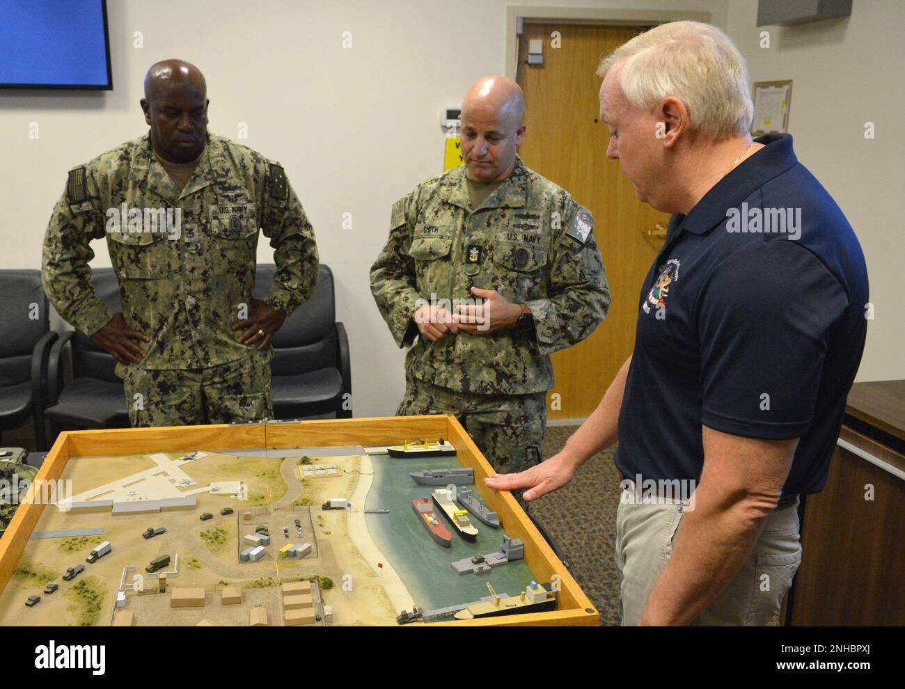 Master Chief Petty Officer of the Navy Russell Smith (center) and Navy ...