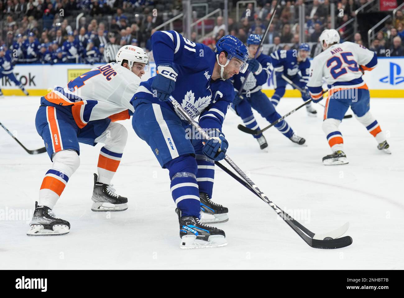 Toronto Maple Leafs center John Tavares (91) looks to pass the puck as ...