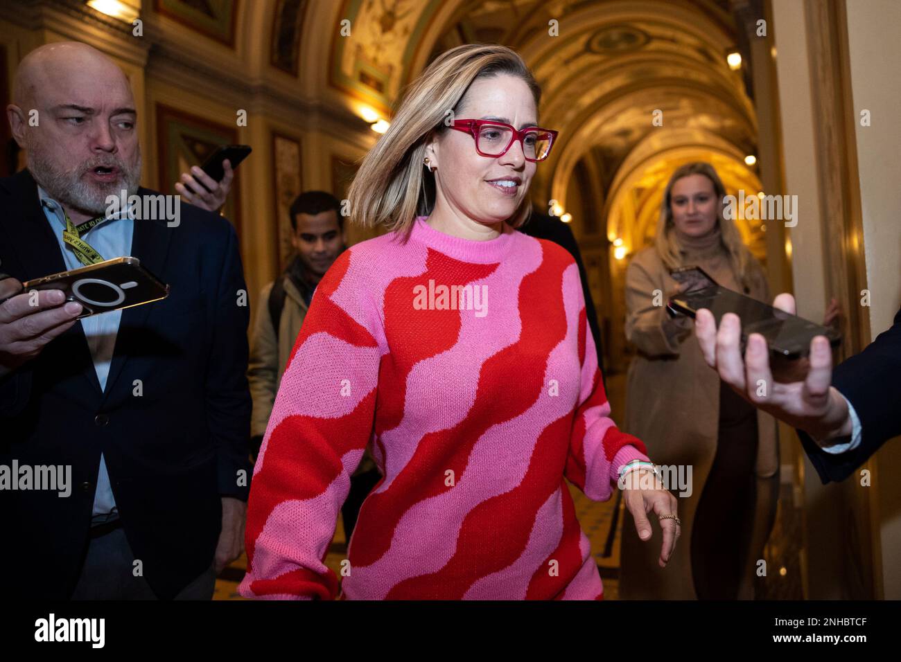 Sen. Kyrsten Sinema (I-Ariz.) speaks with reporters as she departs a ...