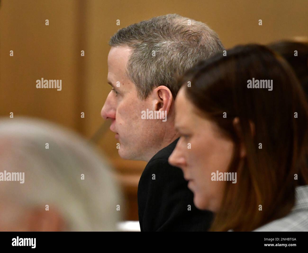 Jeremy Perri, center, argues about witness David Thompson's criminal ...