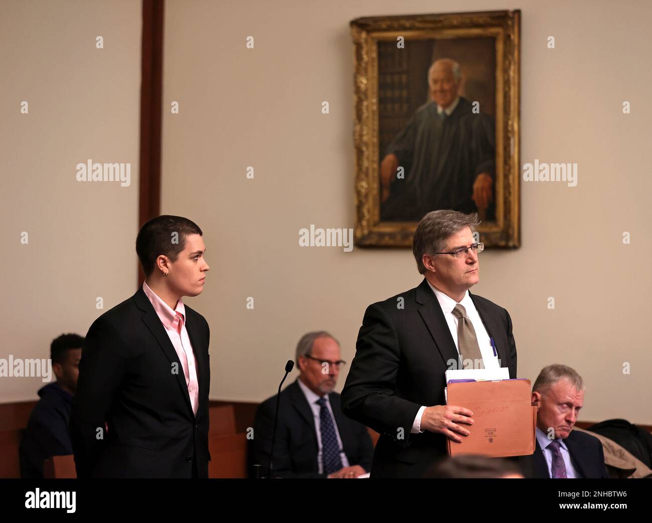 Riley Dowell, left, stands with an attorney during arraignment at ...