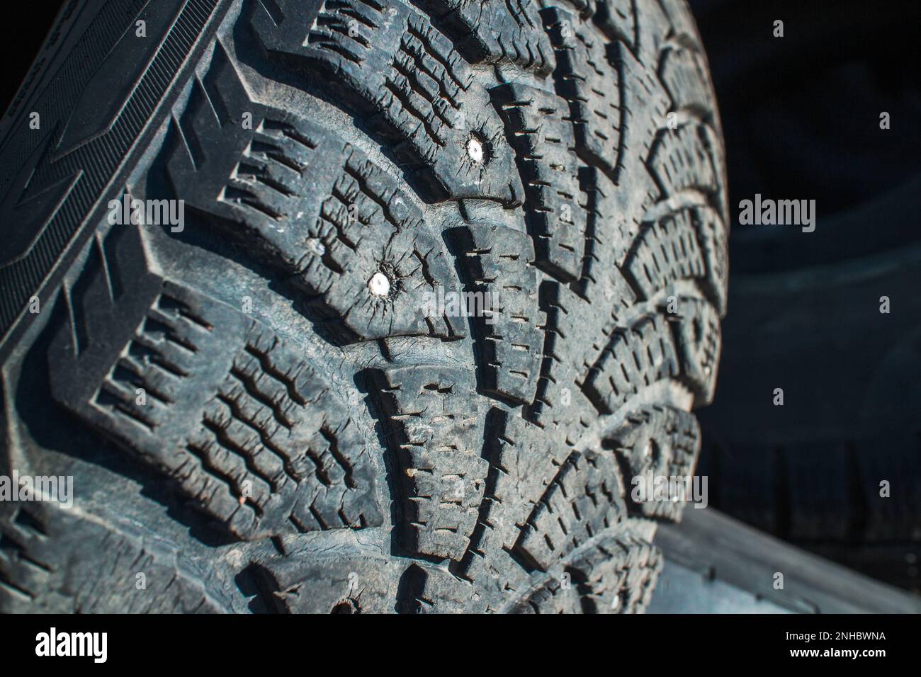 Tread of an old tire close-up Stock Photo - Alamy