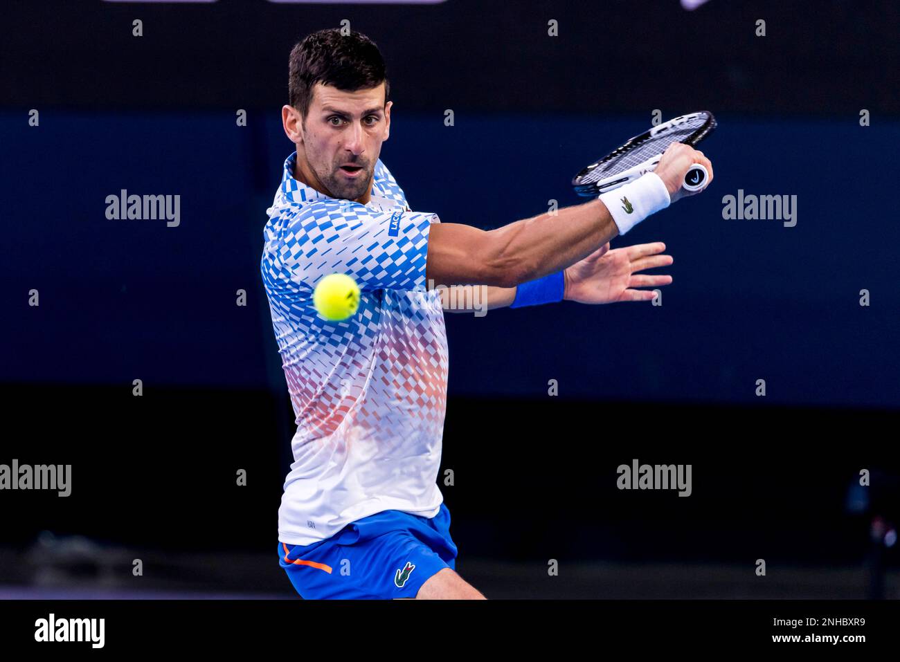 MELBOURNE, VIC - JANUARY 23: Novak Djokovic of Serbia in action during ...