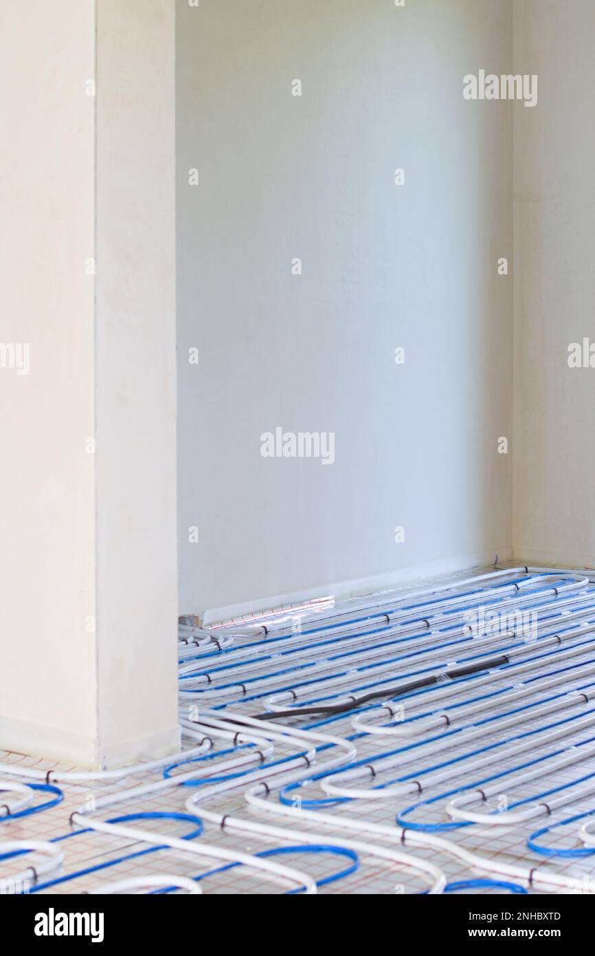 Underfloor heating system installation. Individual Heating Stock Photo ...